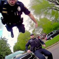 Police officer/cop jumping/flying towards a POV fisheye camera meme
