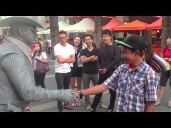 [Image - 560759] | Street Performer Punches Man | Know Your Meme
