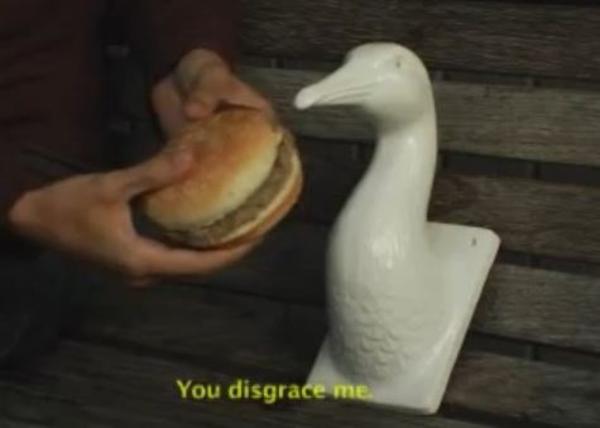 Porcelain duck is disgraced by the man's burger | Reaction Images ...