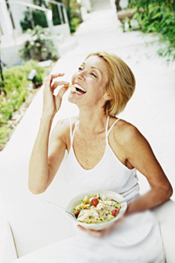 Woman Laughing Alone With Salad | Women Laughing Alone With Salad ...