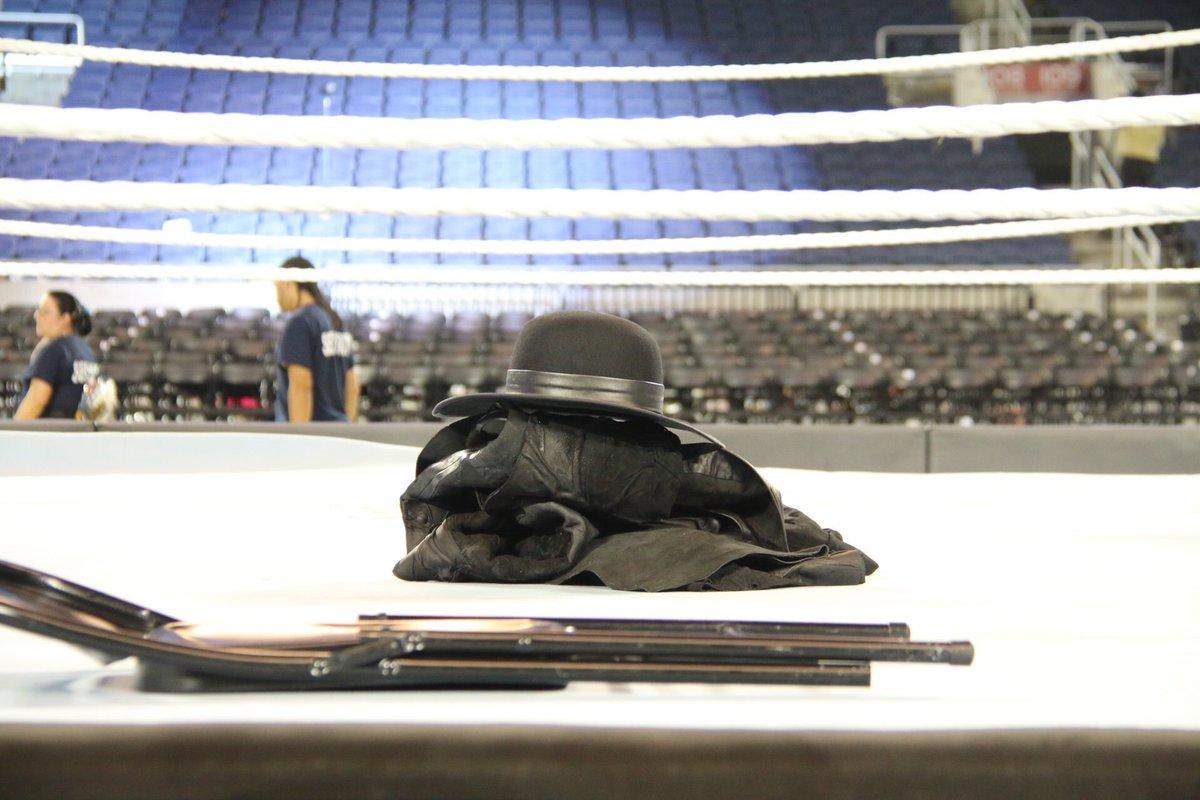 Undertaker leaves gloves, hat and coat in the ring | The Undertaker ...