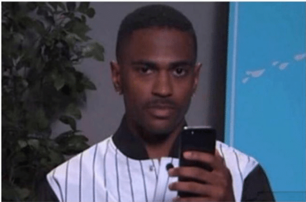 black guy on the phone reacts | Know Your Meme