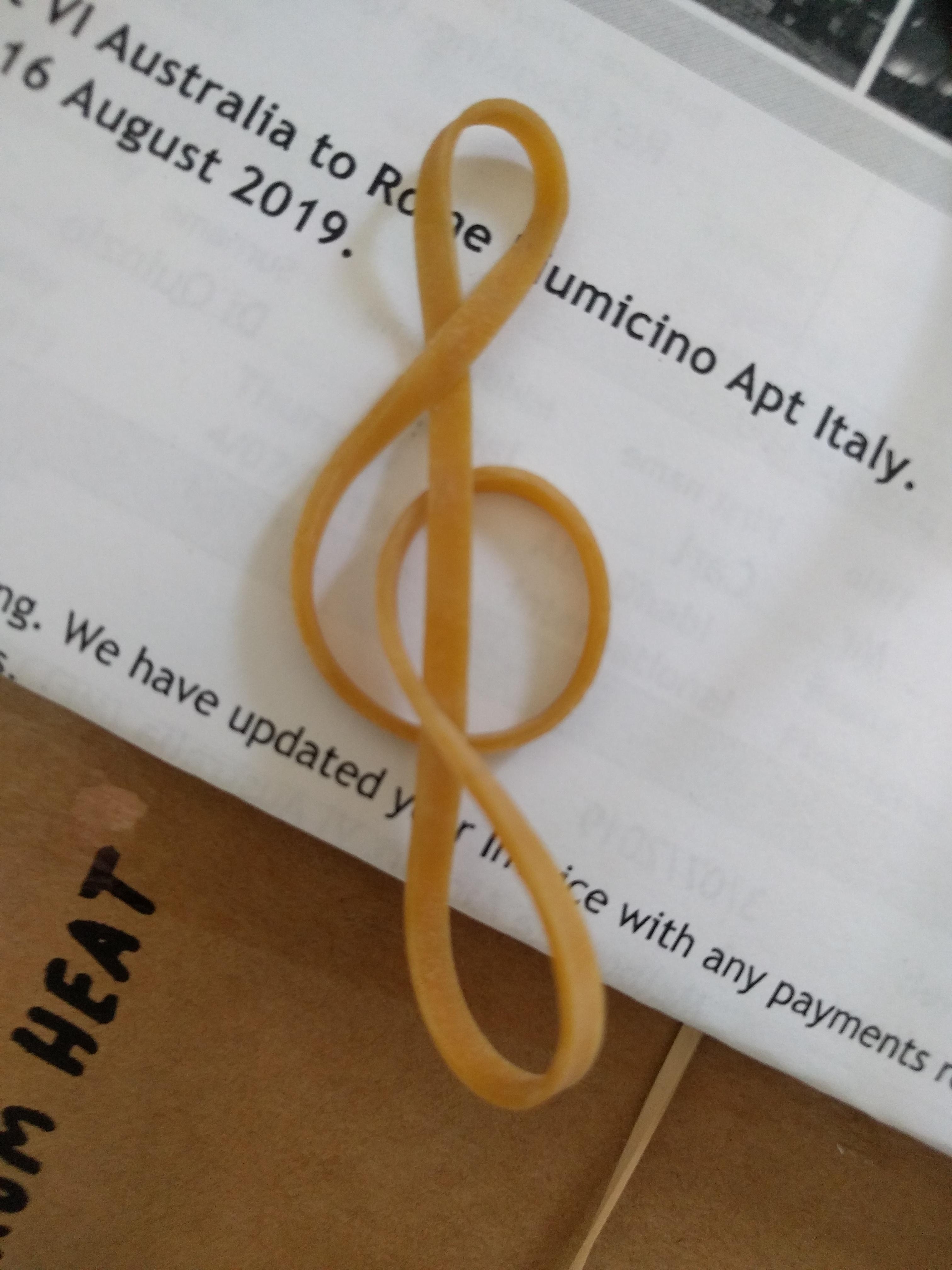 This elastic band landed in a perfect treble clef | r/mildlyinteresting ...