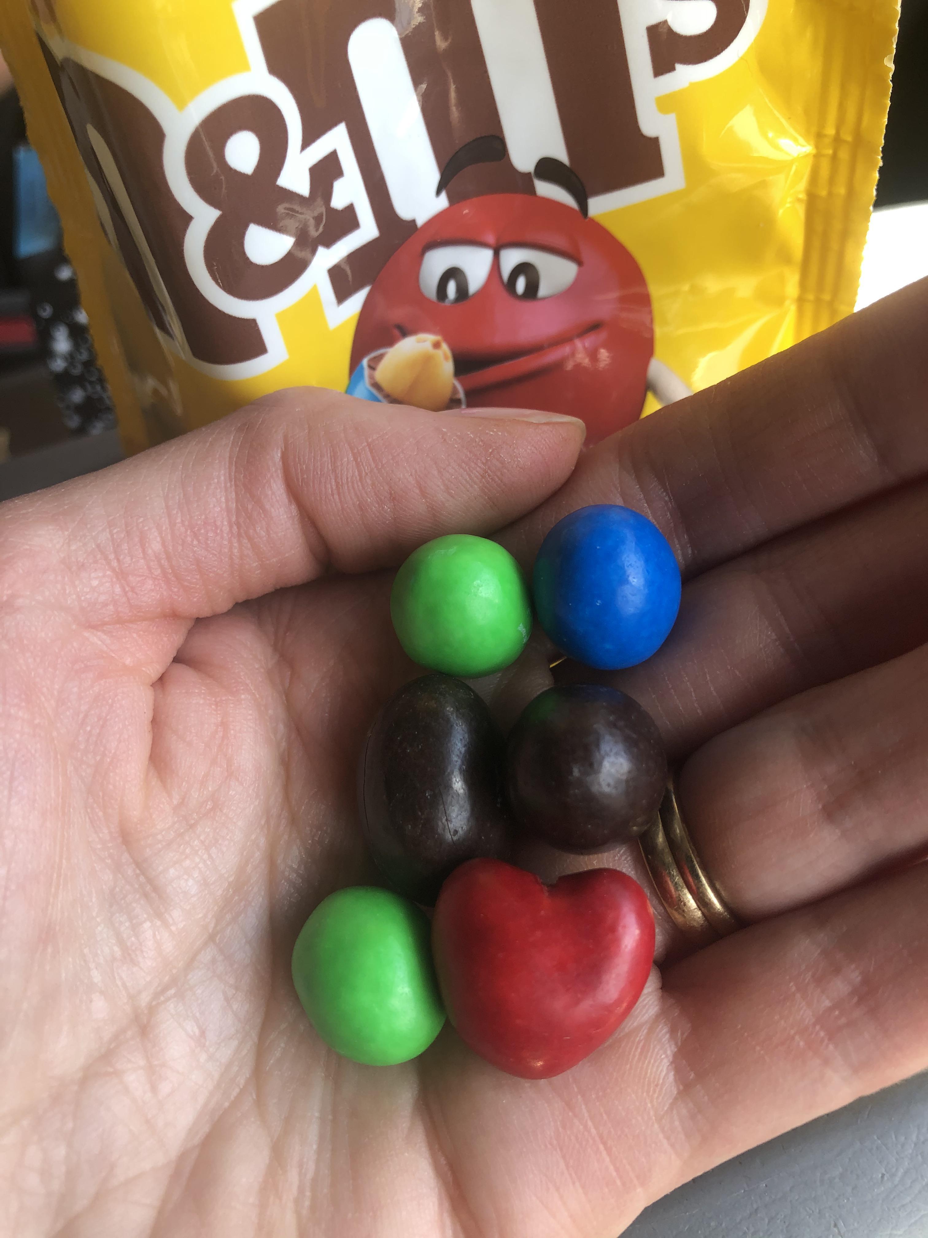 This totally perfect heart shaped peanut M&M today... and it just ...