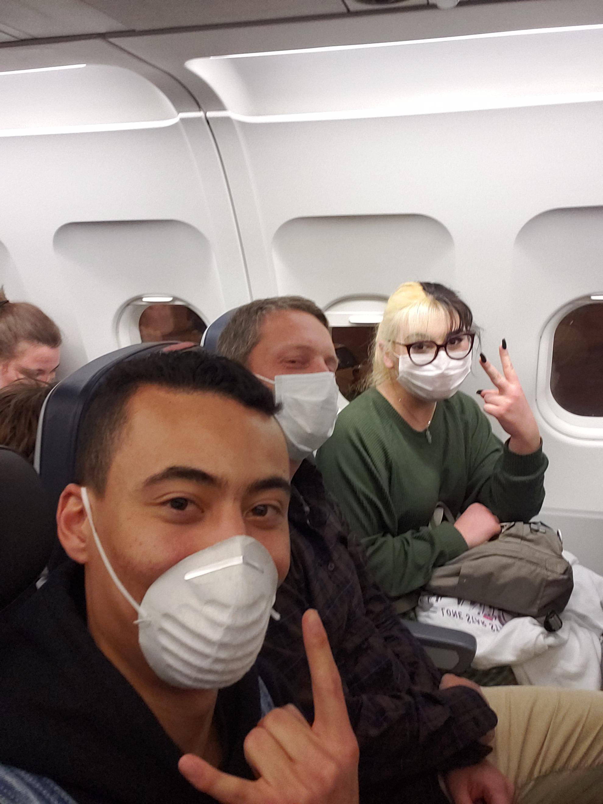 3 random strangers were wearing face masks to reduce likelihood of ...