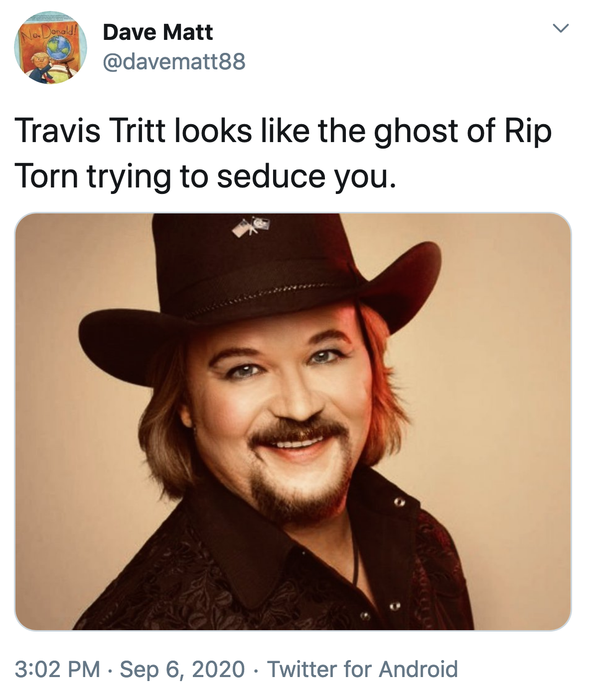 Travis Tritt looks like the ghost of Rip Torn trying to seduce you ...
