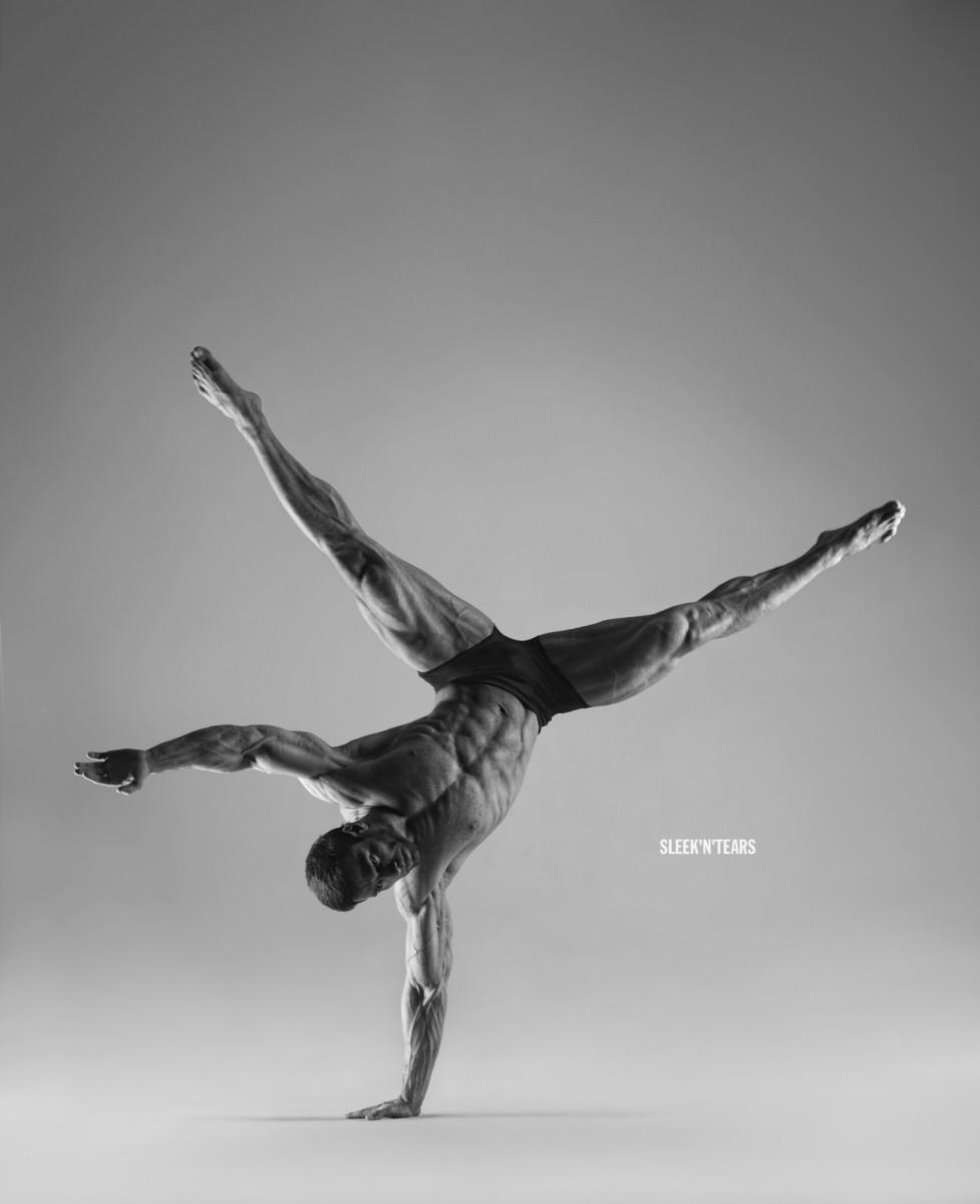 Gigachad one hand hand stand | GigaChad | Know Your Meme