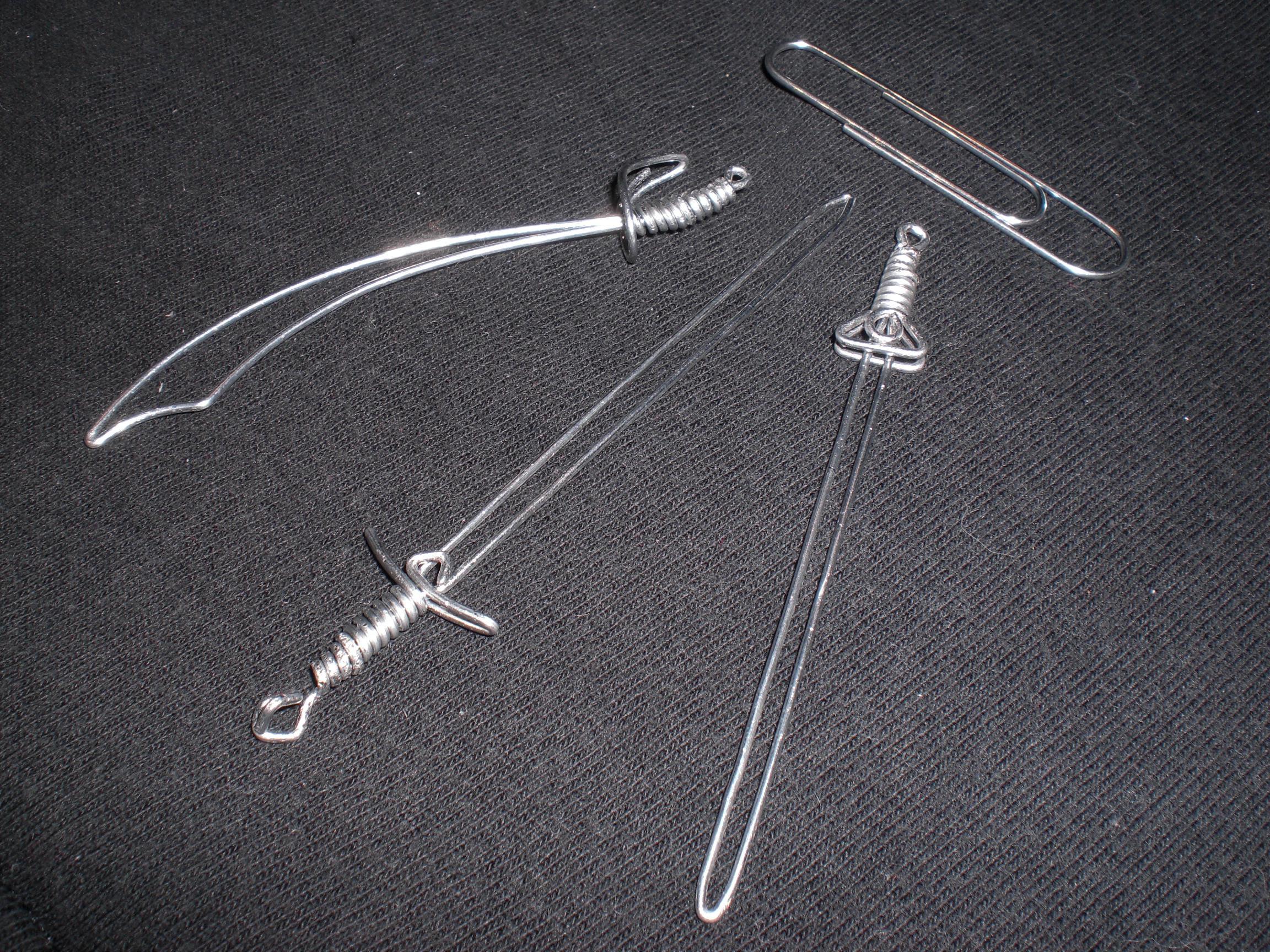 A different view: Each made using two paperclips and needle nose pliers ...