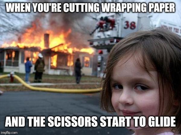 Disaster Girl | Cutting Wrapping Paper and the Scissors Start to Glide ...