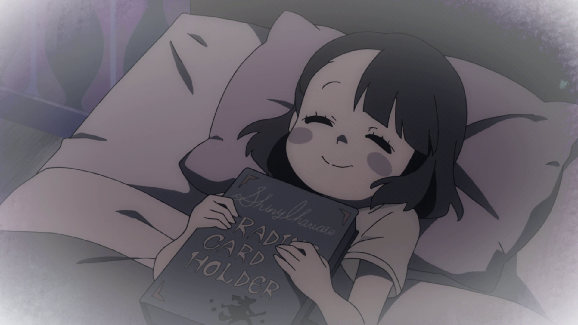 Flashback of Kid Akko happily lying in bed, hugging her Shiny Chariot ...