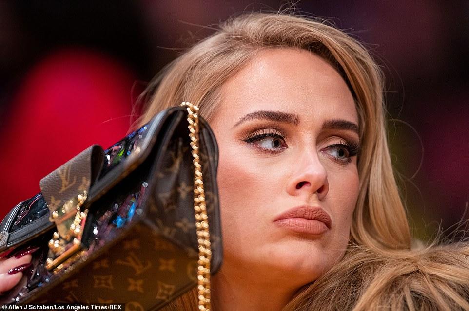 Adele Hiding Behind Purse meme | Adele Hiding Behind Purse | Know Your Meme