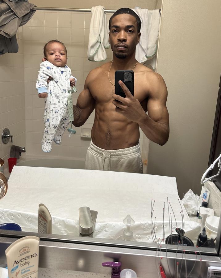 Black Guy Holding a Baby | Guys Holding Babies / "You Got 48 Hours to ...