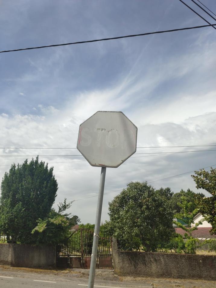 This faded stop sign | Know Your Meme