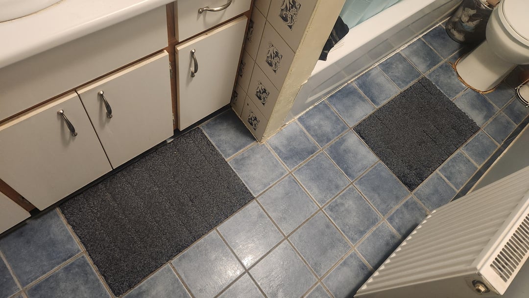 These floor mats fit the tiles perfectly | Know Your Meme