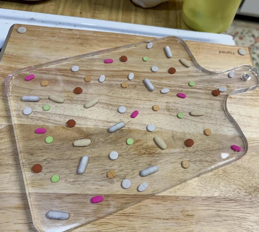 Resin charcuterie board with pills in it | Know Your Meme