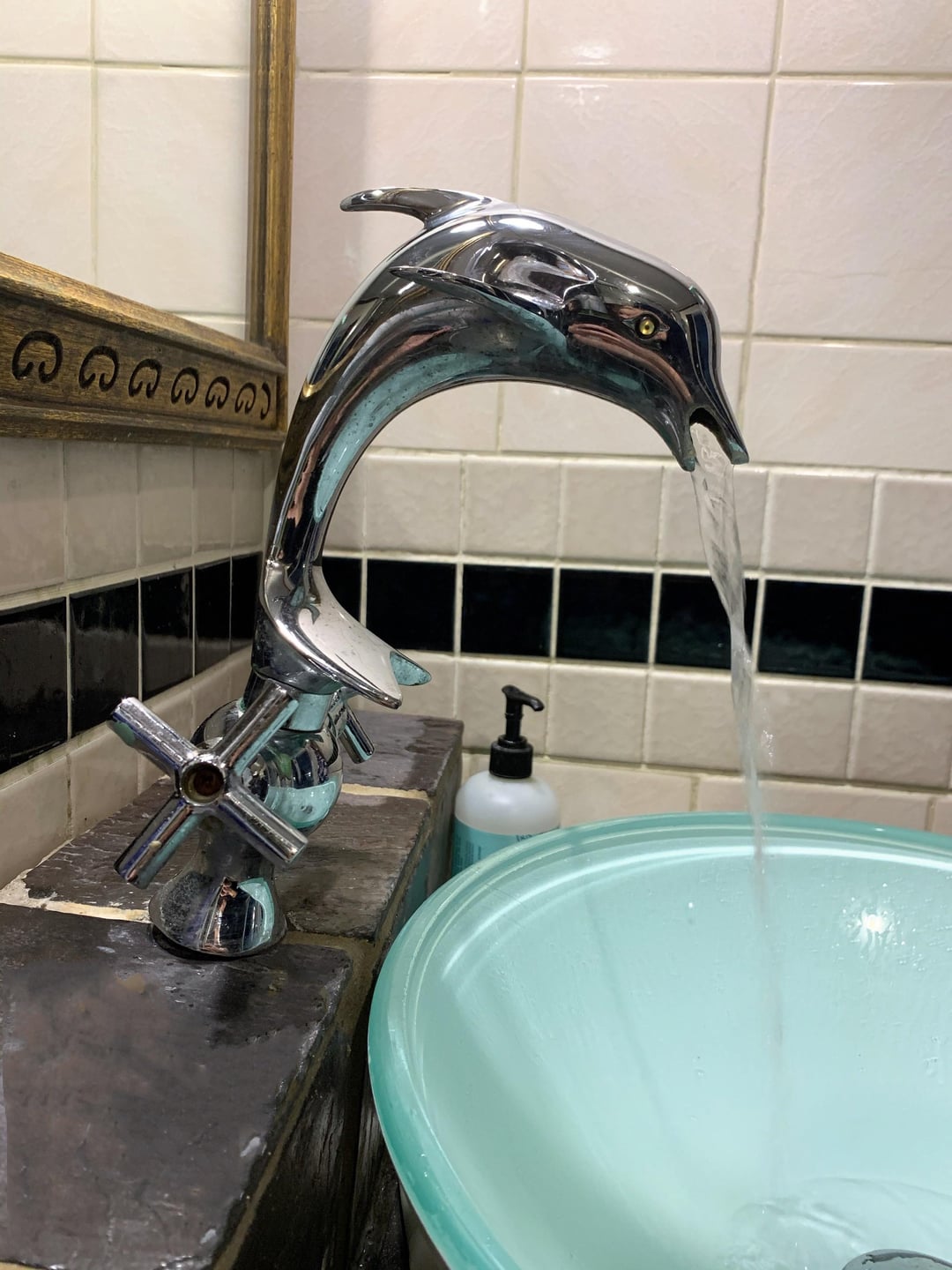 This dolphin faucet | Awful Taste, But Great Execution | Know Your Meme
